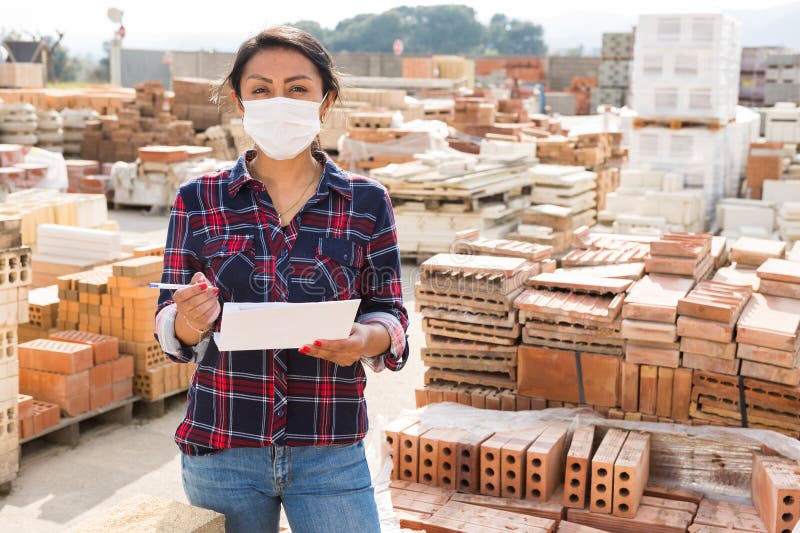 Woman Manager Leads the Accounting of Materials at Construction Site ...
