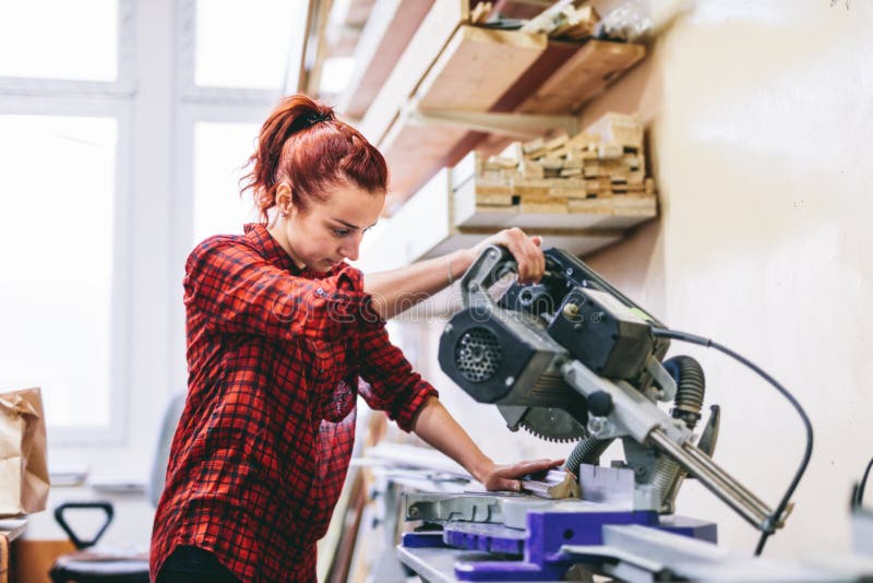 Woman Manual Worker Operating Tools in Workshop Stock Photo - Image of ...