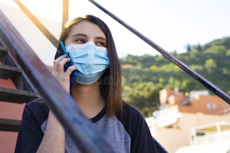 Woman with Mask Talking on the Phone. Mask and COVID-19 Concept Stock ...