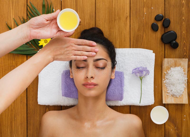 Woman Massagist Make Face Lifting Massage In Spa Wellness Center Stock