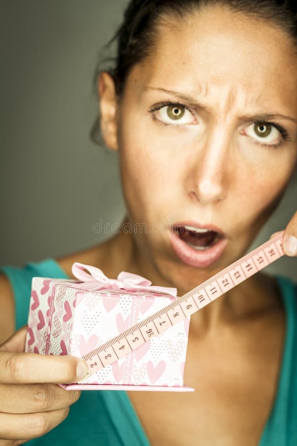 Woman measures a gift stock image. Image of lifestyle - 33226011
