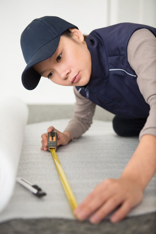 Woman measuring roll stock photo. Image of mate, paper - 263375234