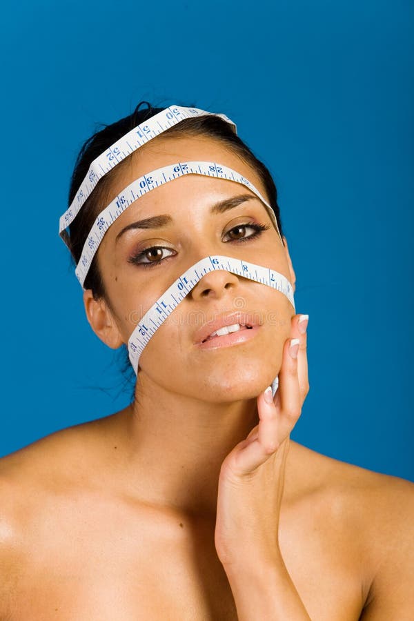 Woman with measuring tape stock photo. Image of beauty - 4129208