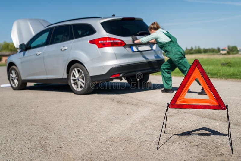 Mechanic with Laptop Diagnosing Broken Car on Roadside Stock Image ...