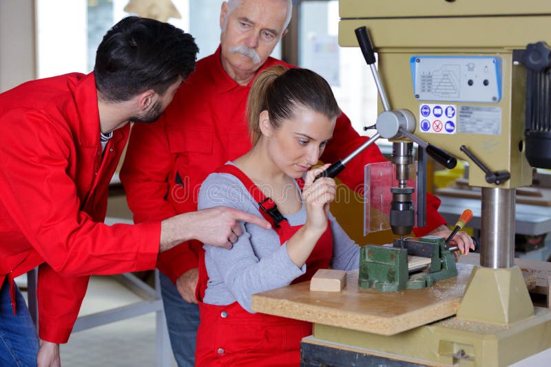 Woman Mechanic Using Vertical Electric Dill Machine Stock Photo - Image ...