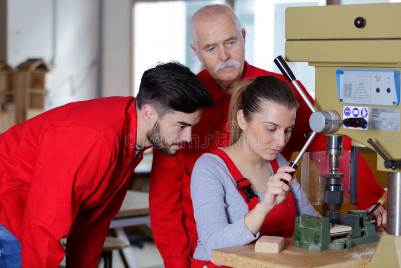 Woman Mechanic Using Vertical Electric Dill Machine Stock Image - Image ...