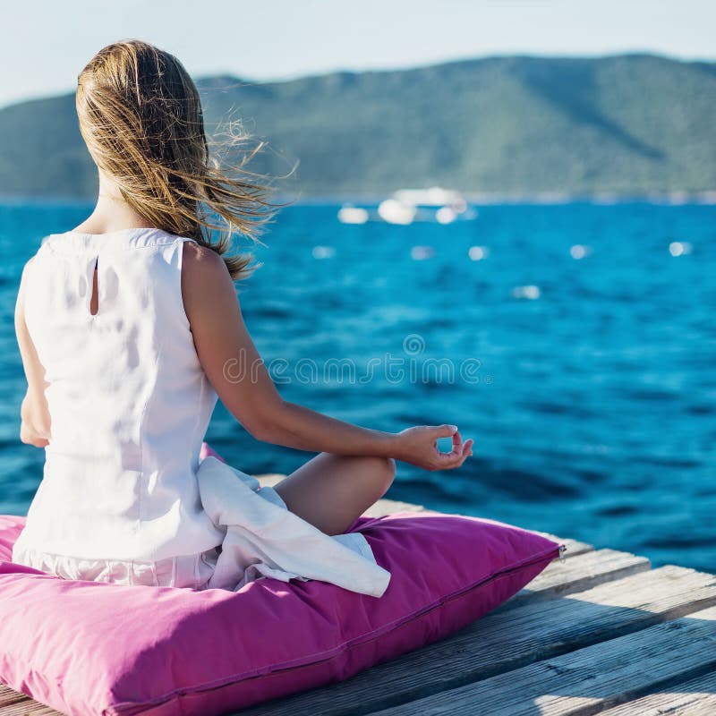 Woman Meditating at the Sea Stock Image - Image of calm, breathe: 52184291