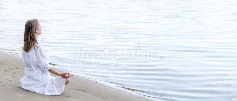 Woman Meditating at the Sea Stock Photo - Image of quiet, fitness: 74243202