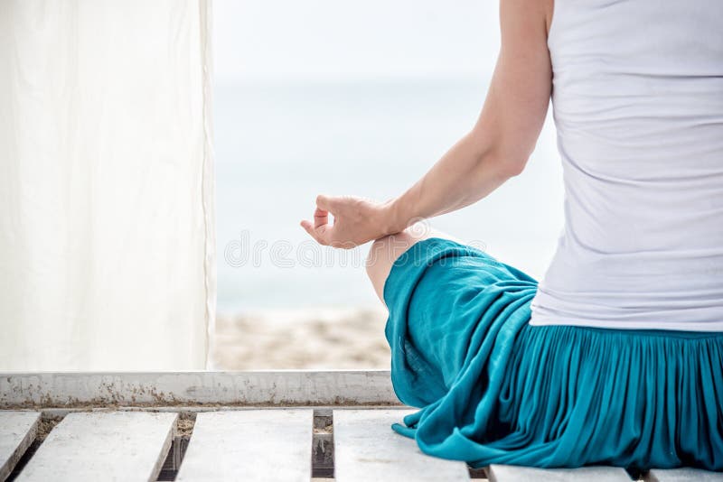 Woman Meditating at the Sea Stock Image - Image of body, perfection ...