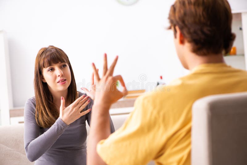 The Woman and Man Learning Sign Language Stock Image - Image of hearing ...