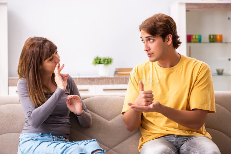 The Woman and Man Learning Sign Language Stock Photo - Image of letter ...