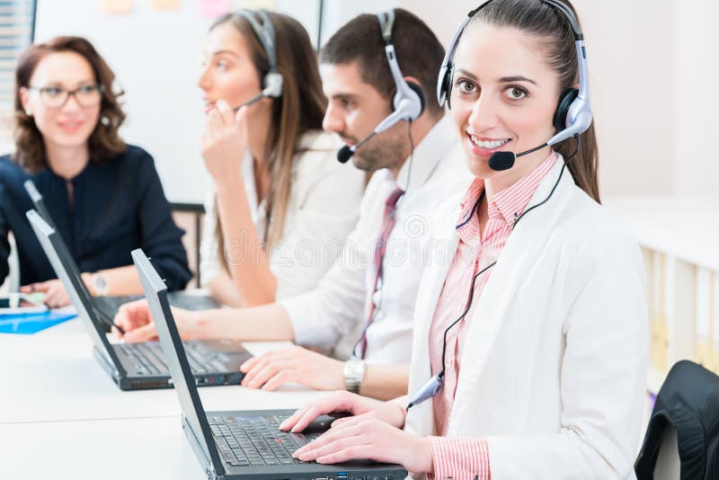 Woman and Men Working As Call Center Agents Stock Photo - Image of ...