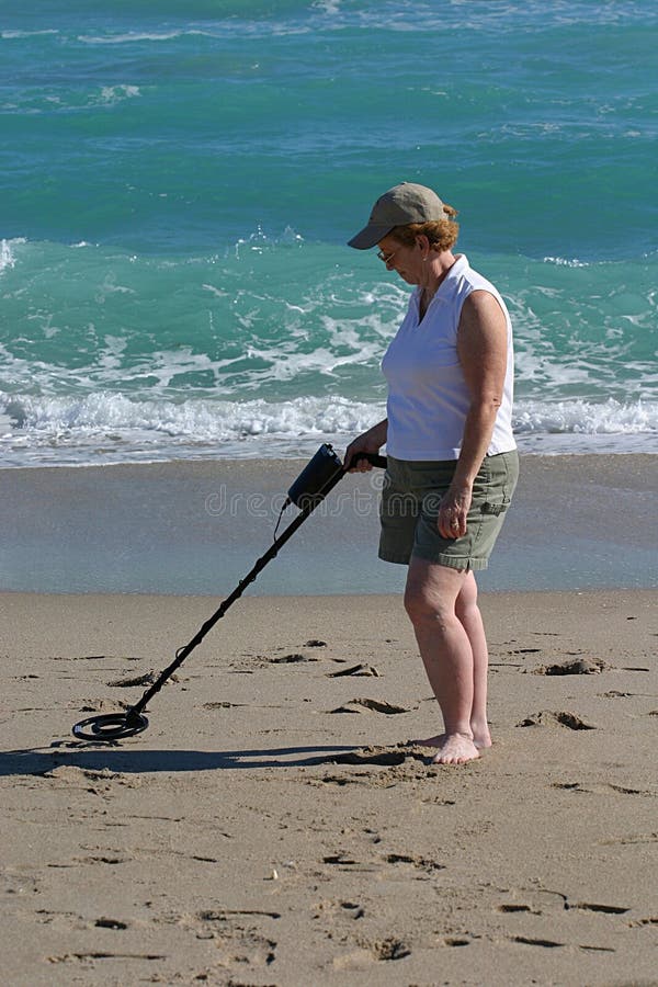 Woman with Metal Detector stock image. Image of detect, coil - 58429