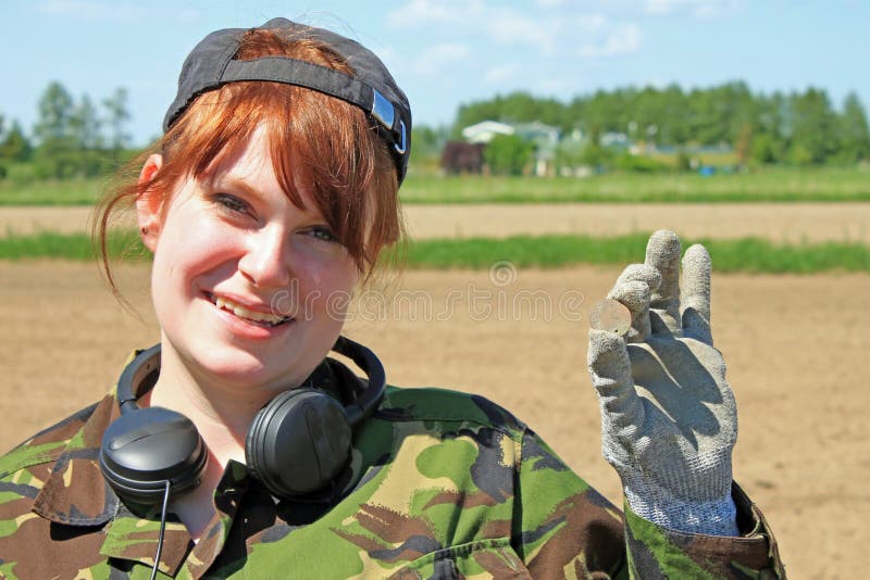 Woman with metal detector stock image. Image of history - 54519611