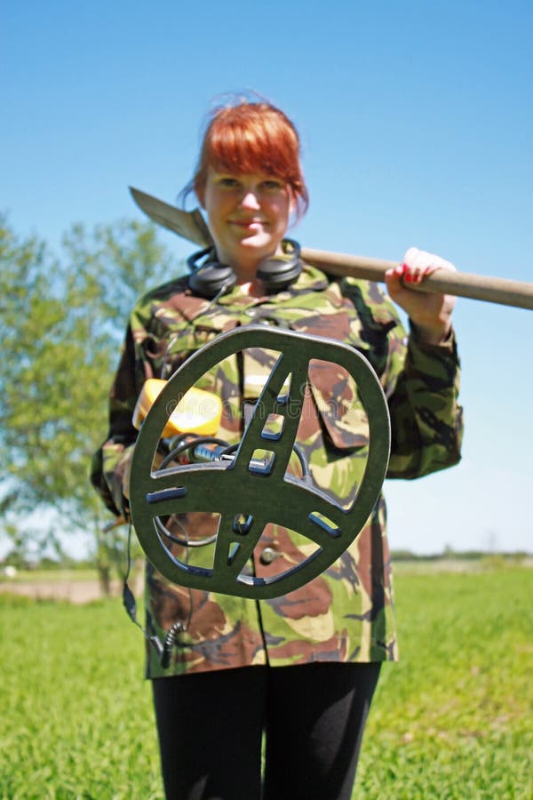 Woman with metal detector stock image. Image of fields - 54548507