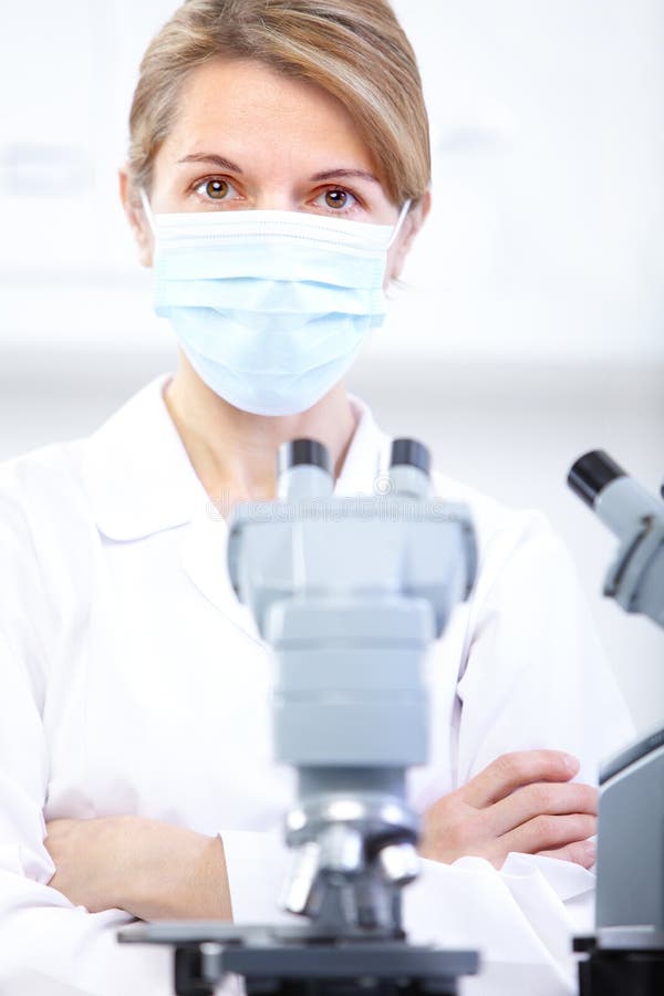 Woman with microscope stock image. Image of health, people - 17029633