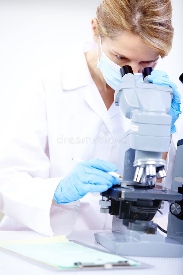 Woman with microscope stock photo. Image of laboratorian - 17029644