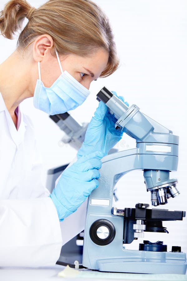 Doctor Using a Microscope stock photo. Image of hospital - 4891592