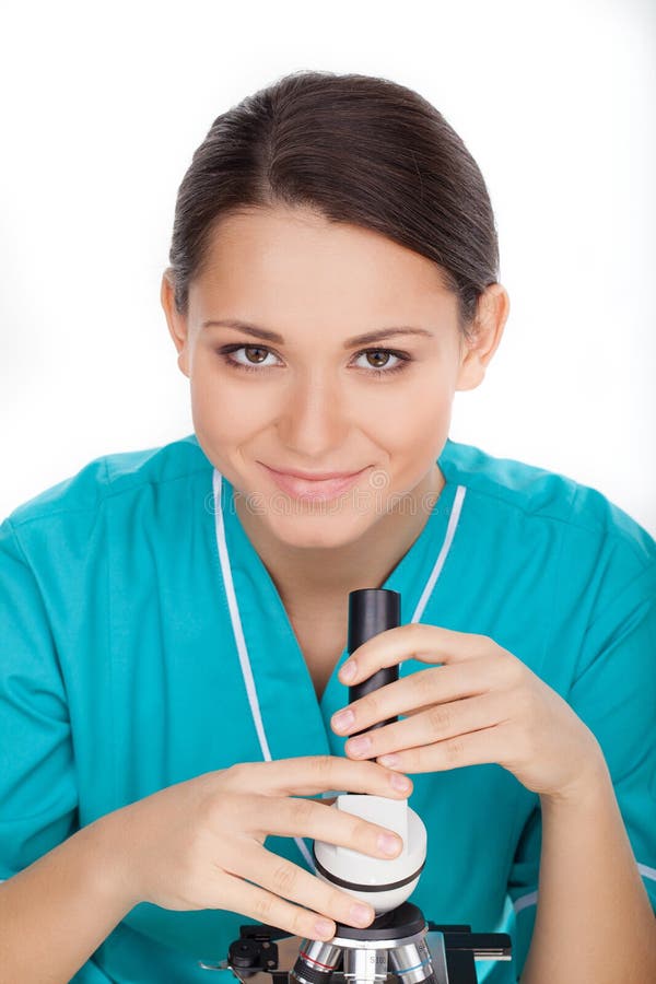 Woman with microscope. stock photo. Image of experiment - 33054604