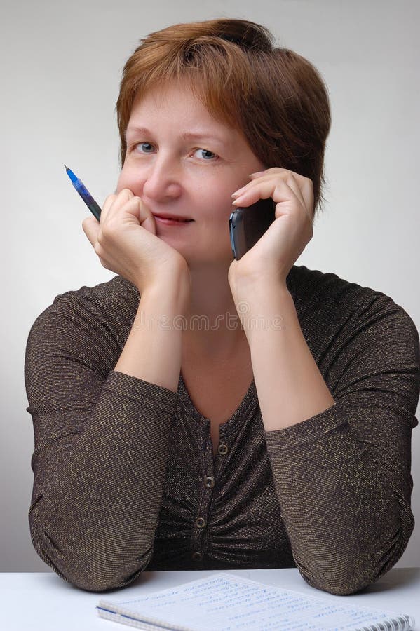 Woman with mobile phone stock photo. Image of office - 11179188