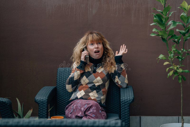 Woman with Mobile Phone on Terrace at Home Stock Photo - Image of ...
