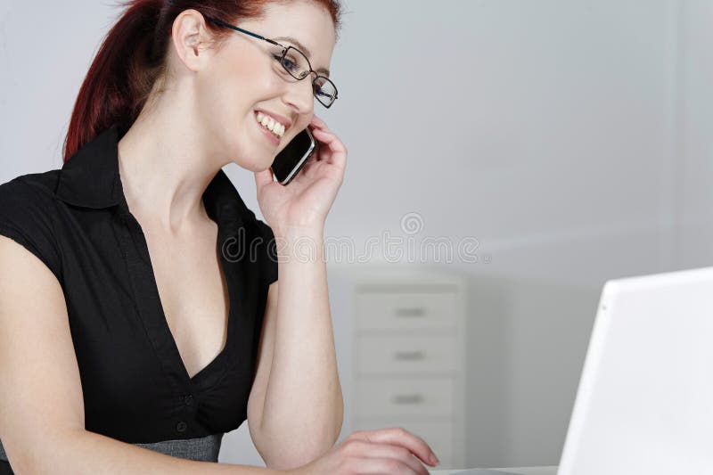 Woman on mobile at work stock image. Image of professional - 25673571