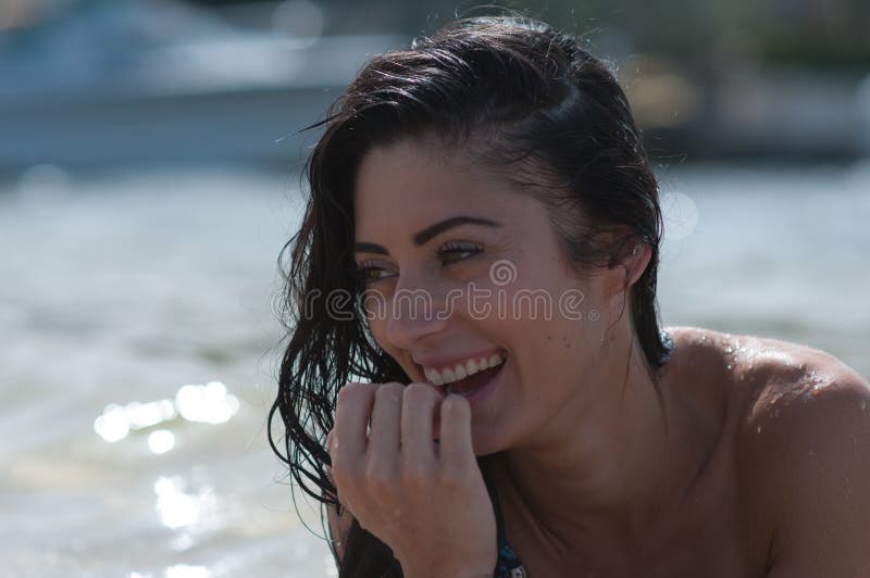 Woman Model at the Beach in Bright Sunlight. Stock Image - Image of ...