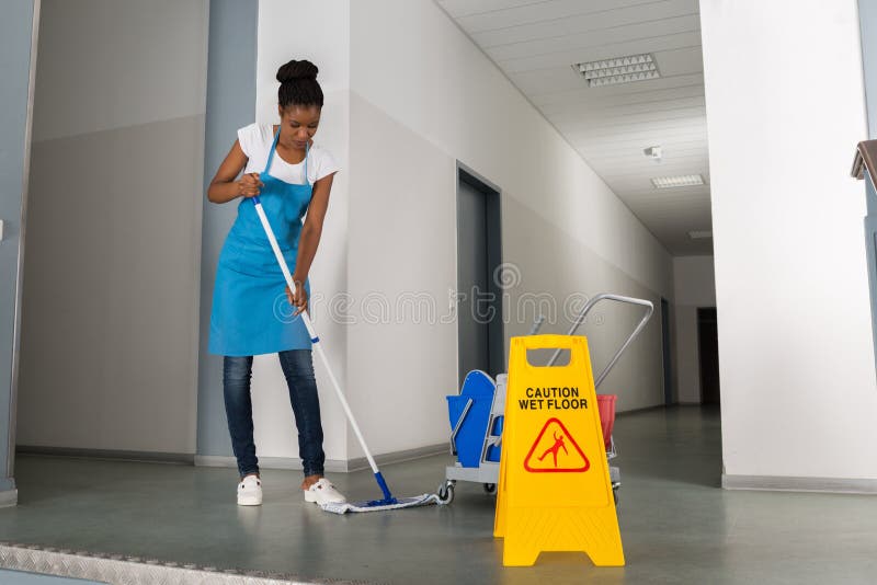 Woman Mopping Corridor stock photo. Image of hygiene - 74155118