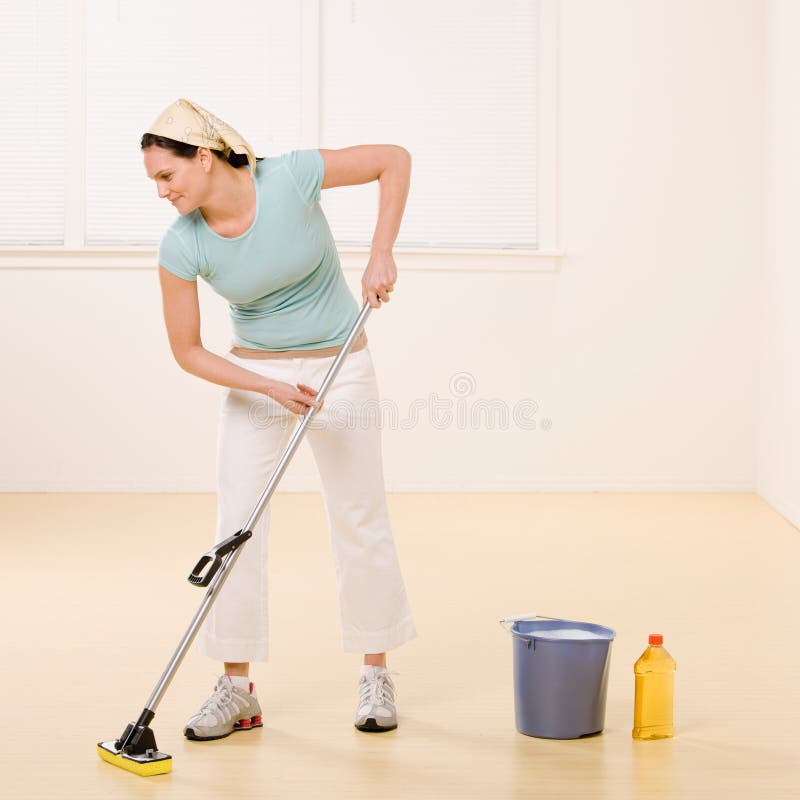 Woman Mopping Floor with Cleaner Stock Photo - Image of western ...