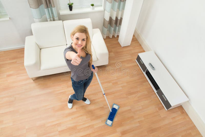 Woman Mopping Floor stock image. Image of living, clean - 57408999