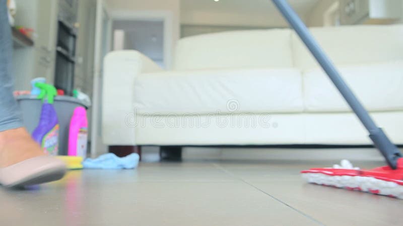 Woman mopping the floor stock footage. Video of mopping - 43239476
