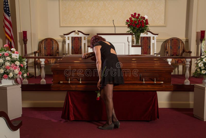 Woman Mourning at Cemetery stock image. Image of graveyard - 2404973