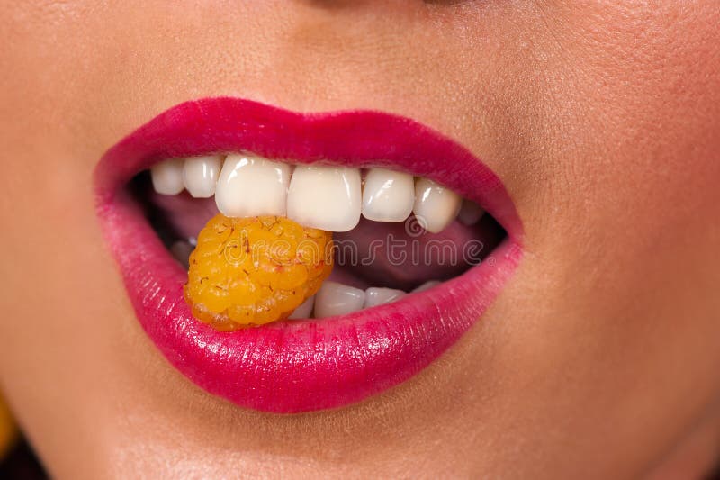 Woman Mouth with Raspberries Stock Photo - Image of fruit, food: 46877690