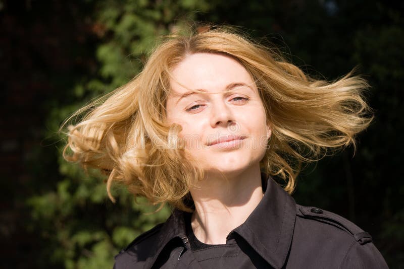 Woman moving hair outdoors stock image. Image of flying - 9460093