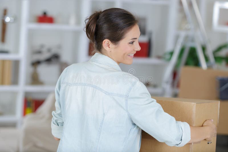 Woman while Moving into House Stock Image - Image of contemplation ...