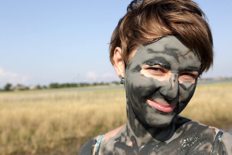 Woman with mud face stock image. Image of lifestyle, firth - 57805369