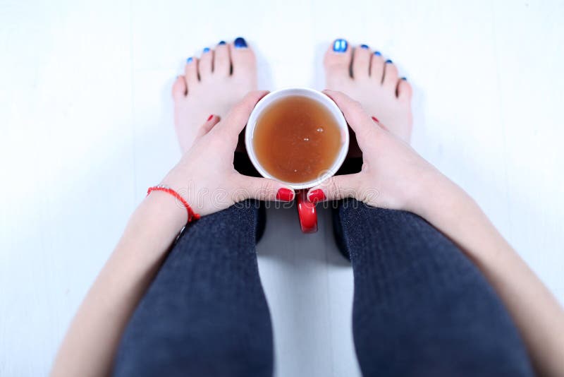Woman with a mug of tea stock image. Image of girl, warm - 71509761