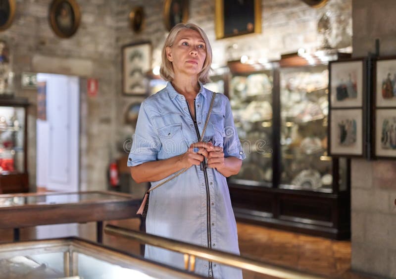 Woman museum visitor stock image. Image of hall, museum - 158823055