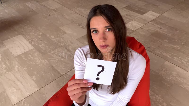 Woman Need Help. Sad Woman Holding Question Sign Stock Footage - Video ...