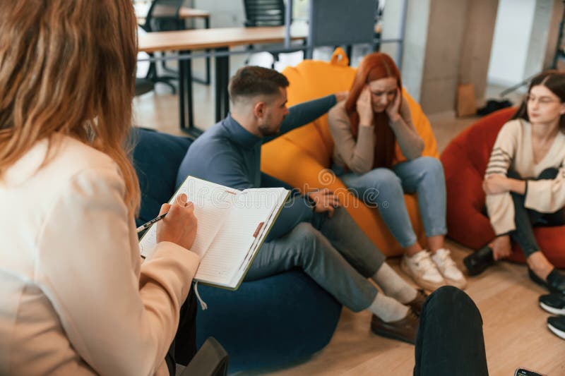 Woman Needs Help. Group of People are Having Therapy Meeting Together ...