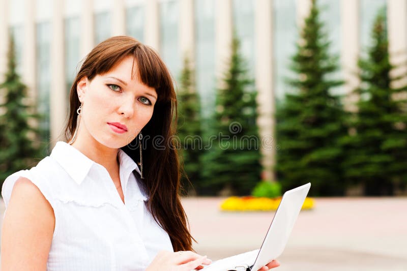 Woman with netbook stock image. Image of positive, mail - 25896747