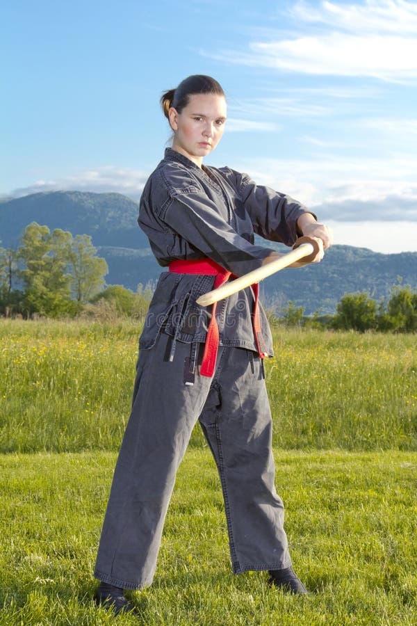 Woman Ninja with Katana Sword Stock Photo - Image of samurai, shuriken ...
