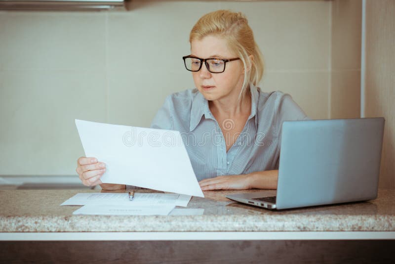 A Woman in Normal Clothes Working at Home. Startup of the Project ...