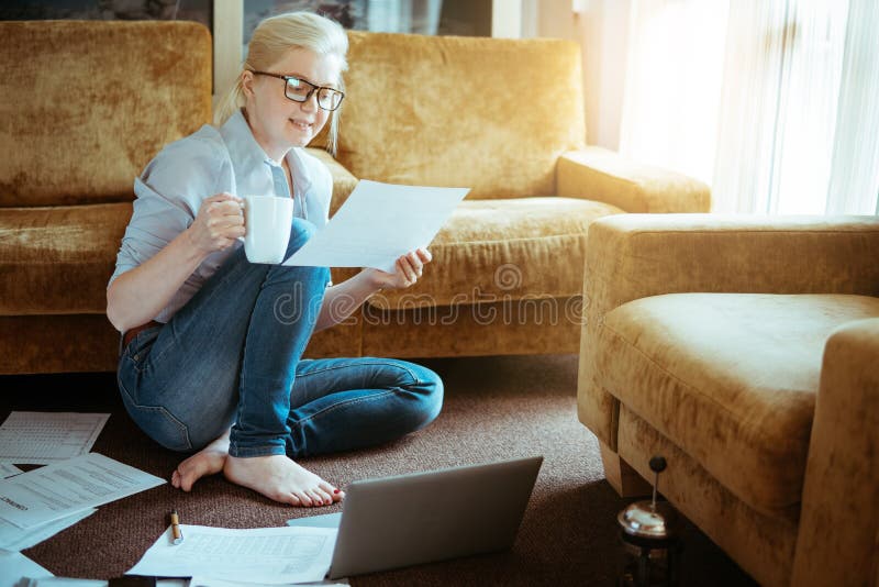 A Woman in Normal Clothes Working at Home. Startup of the Project Stock ...