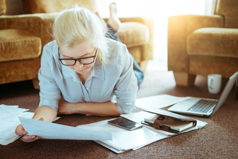 A Woman in Normal Clothes Working at Home. Startup of the Project Stock ...