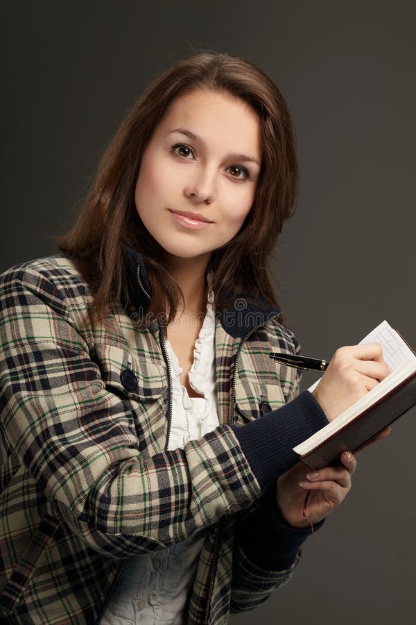 Woman with notebook stock photo. Image of successful - 16763868