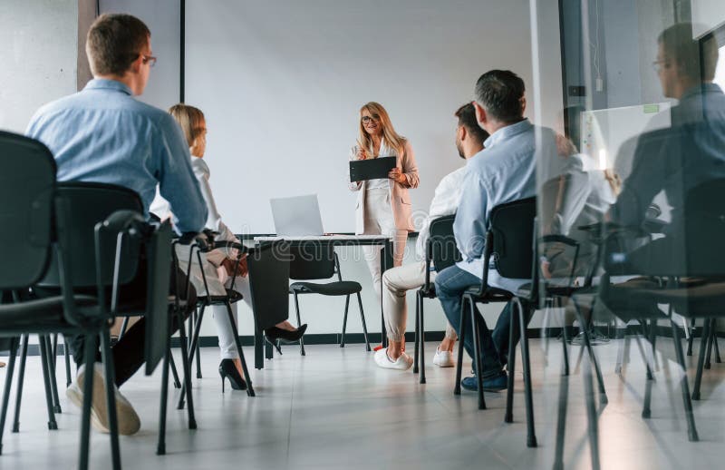 Woman with Notepad in Hands Doing Master Class. Group of Professional ...