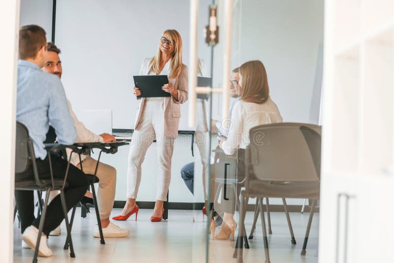 Woman with Notepad in Hands Doing Master Class. Group of Professional ...