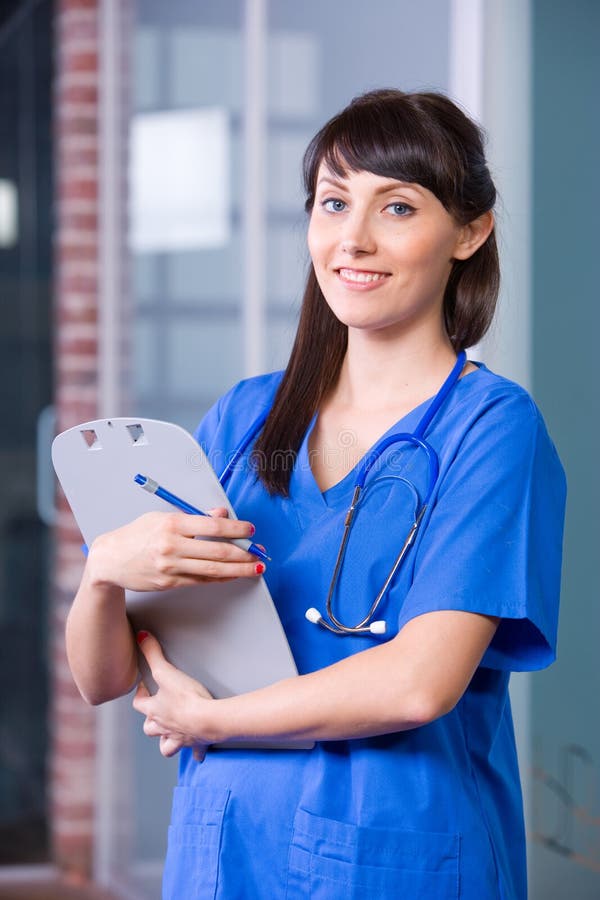 Woman Nurse chart stock photo. Image of doctor, colleague - 10735676