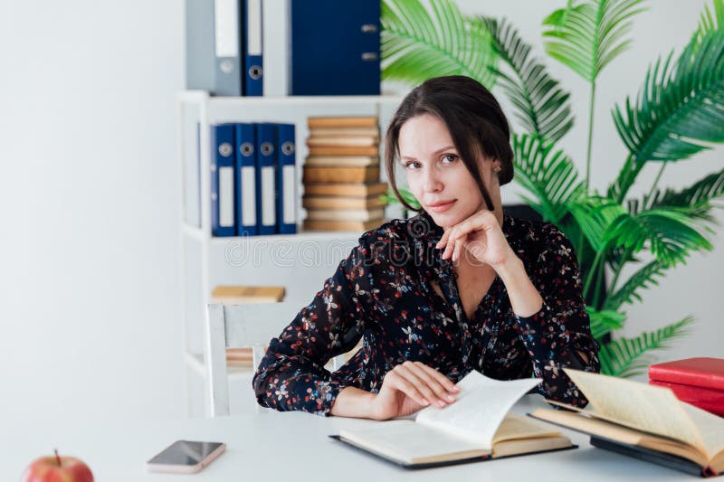 Woman in Office with Book in Class Learning Business Finance Stock ...